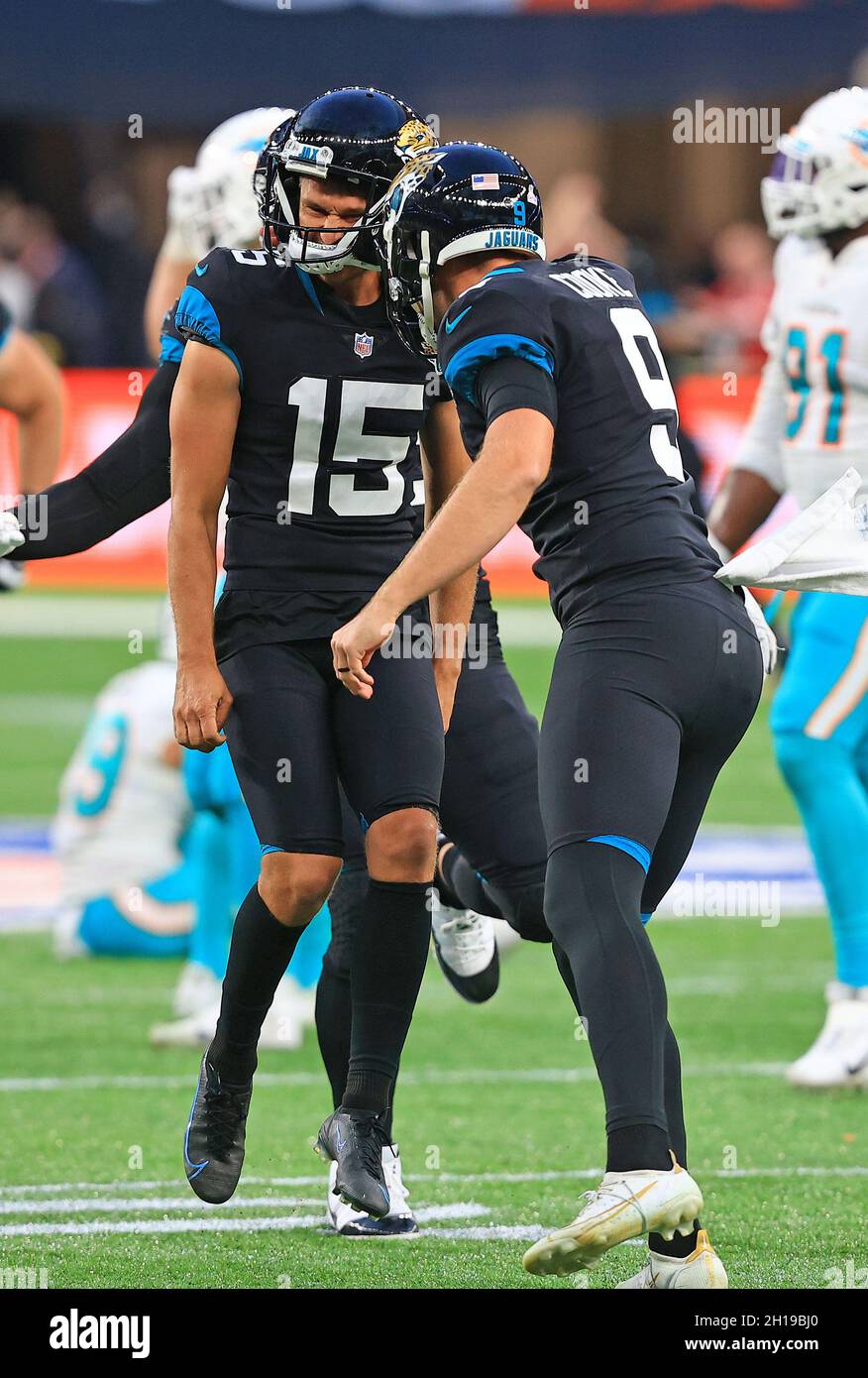 Jacksonville Jaguars kicker Matthew Wright (15) celebrates with punter ...