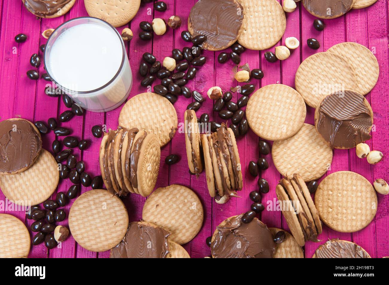 breakfast or snack table full of cookies and chocolate Stock Photo - Alamy