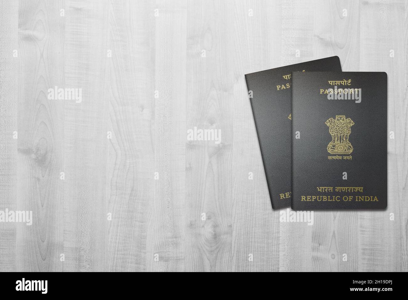 India passport on a white wooden background, issued to Indian citizens ...
