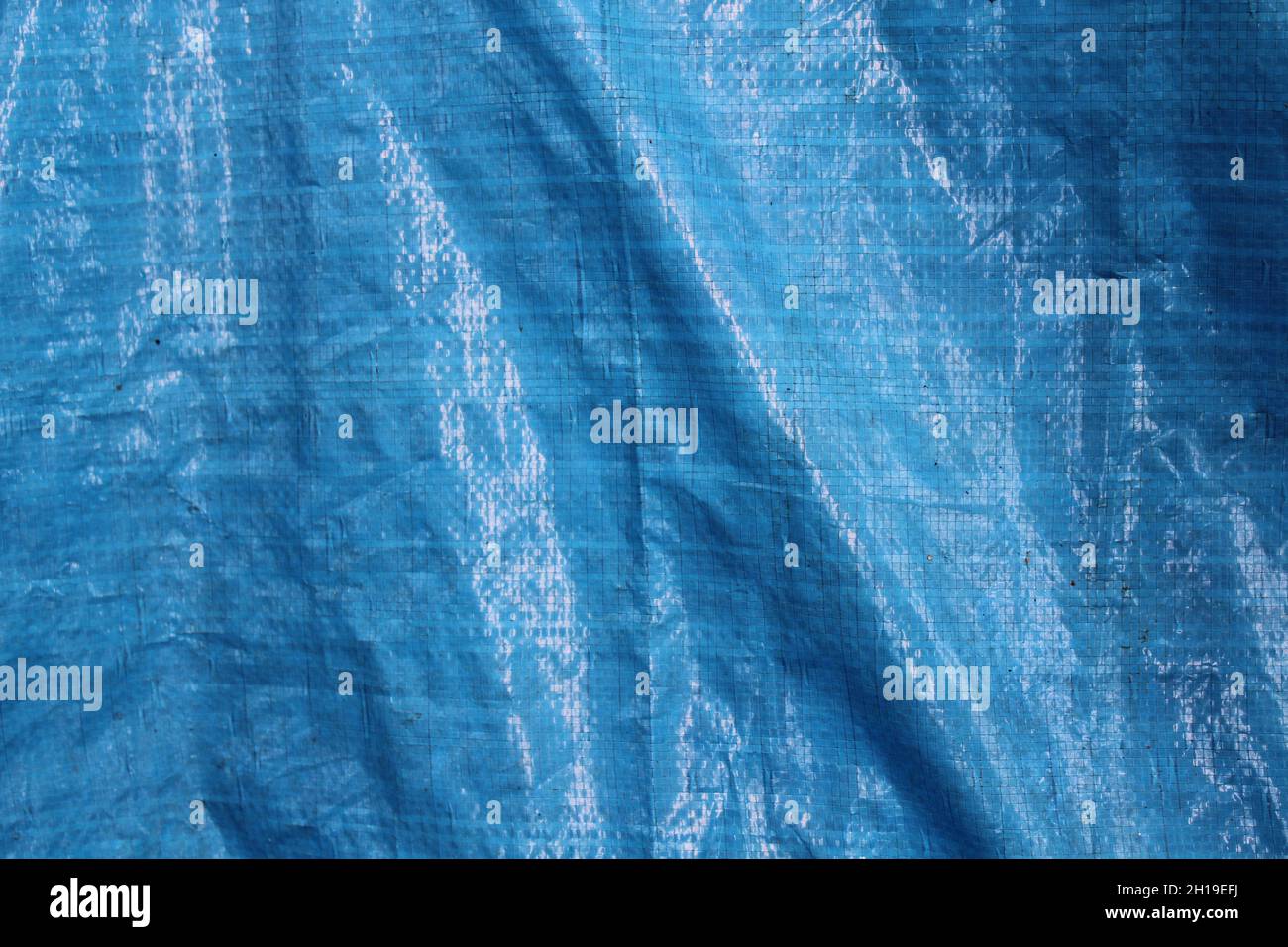 A Blue Tarp Texture Stock Photo - Alamy