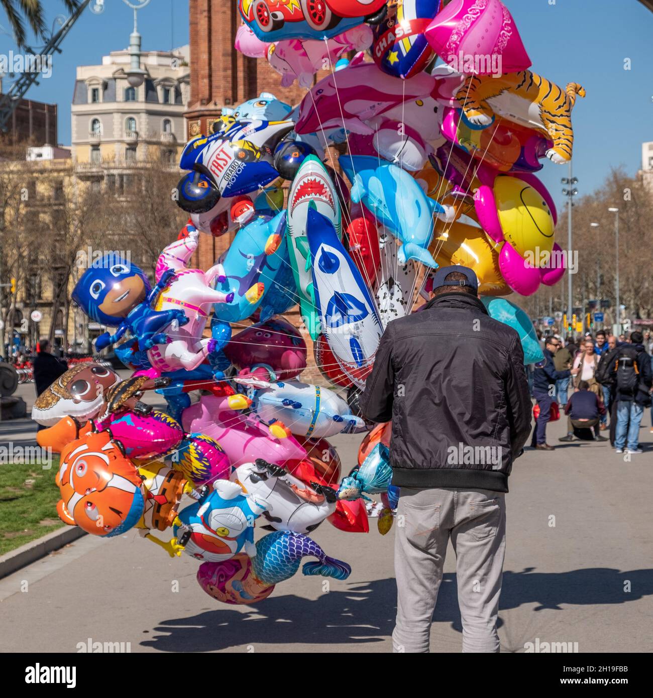 Balloon man selling colourful balloons hi-res stock photography and ...