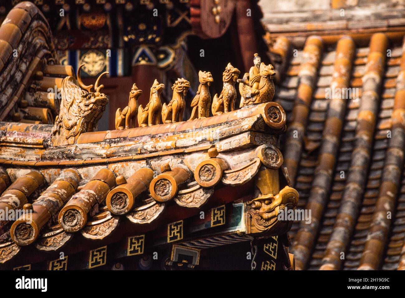 Ceramic figurines on the ridge of the roof of the Lama Temple, a ...