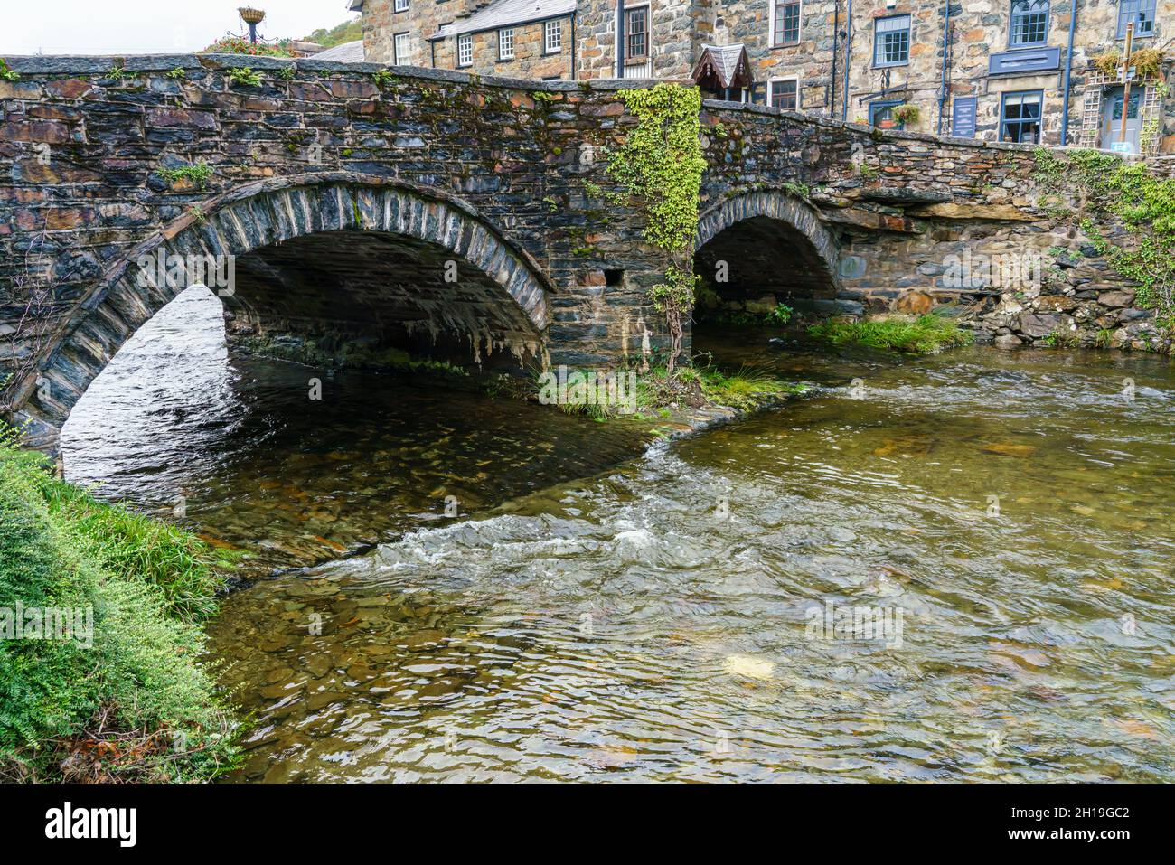 a two arch stone bridge constructed over a river in 1871 in the scenic ...
