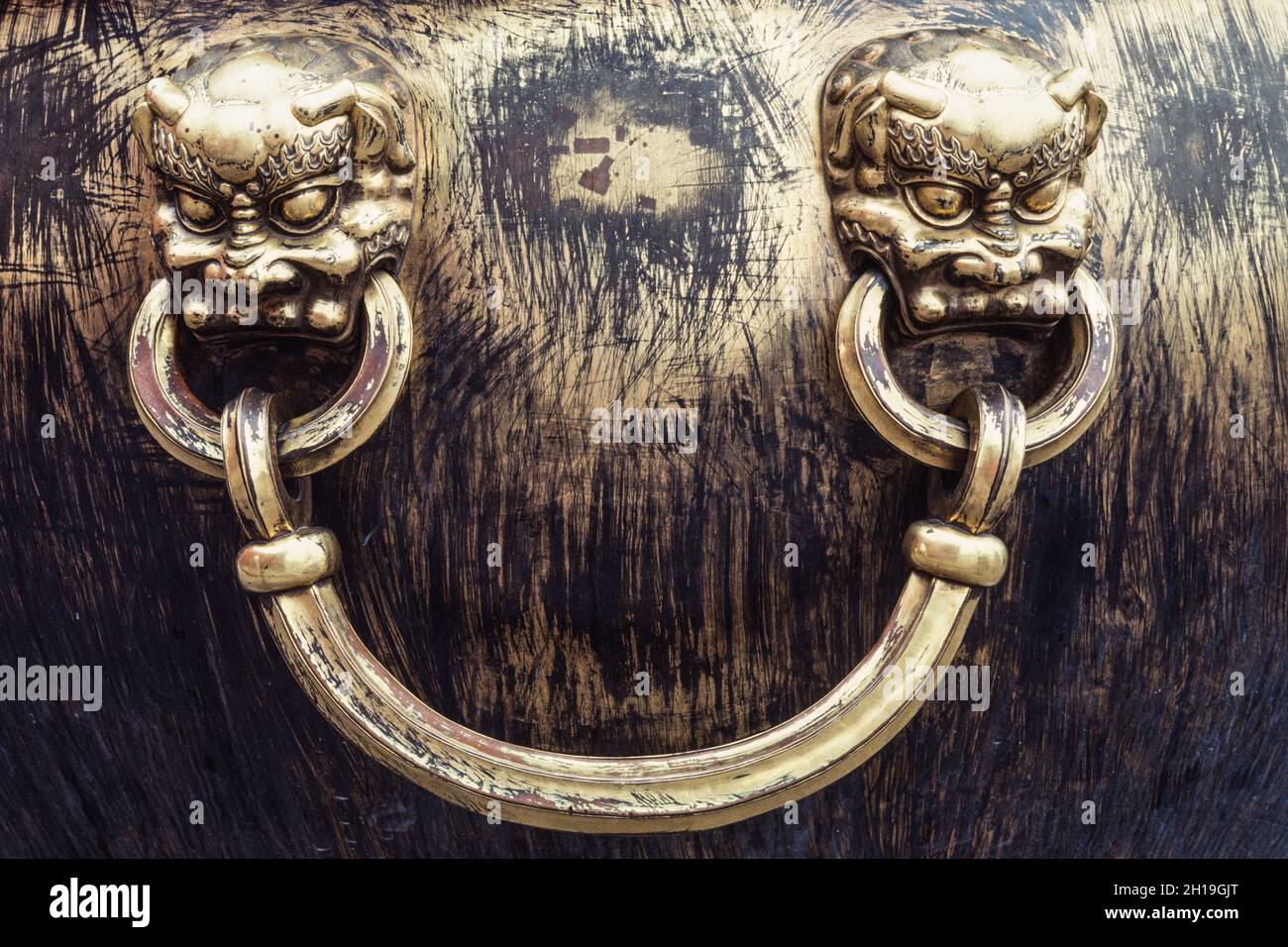 Detail of a gilded cistern in the Forbidden City, Beijing, China. The ...