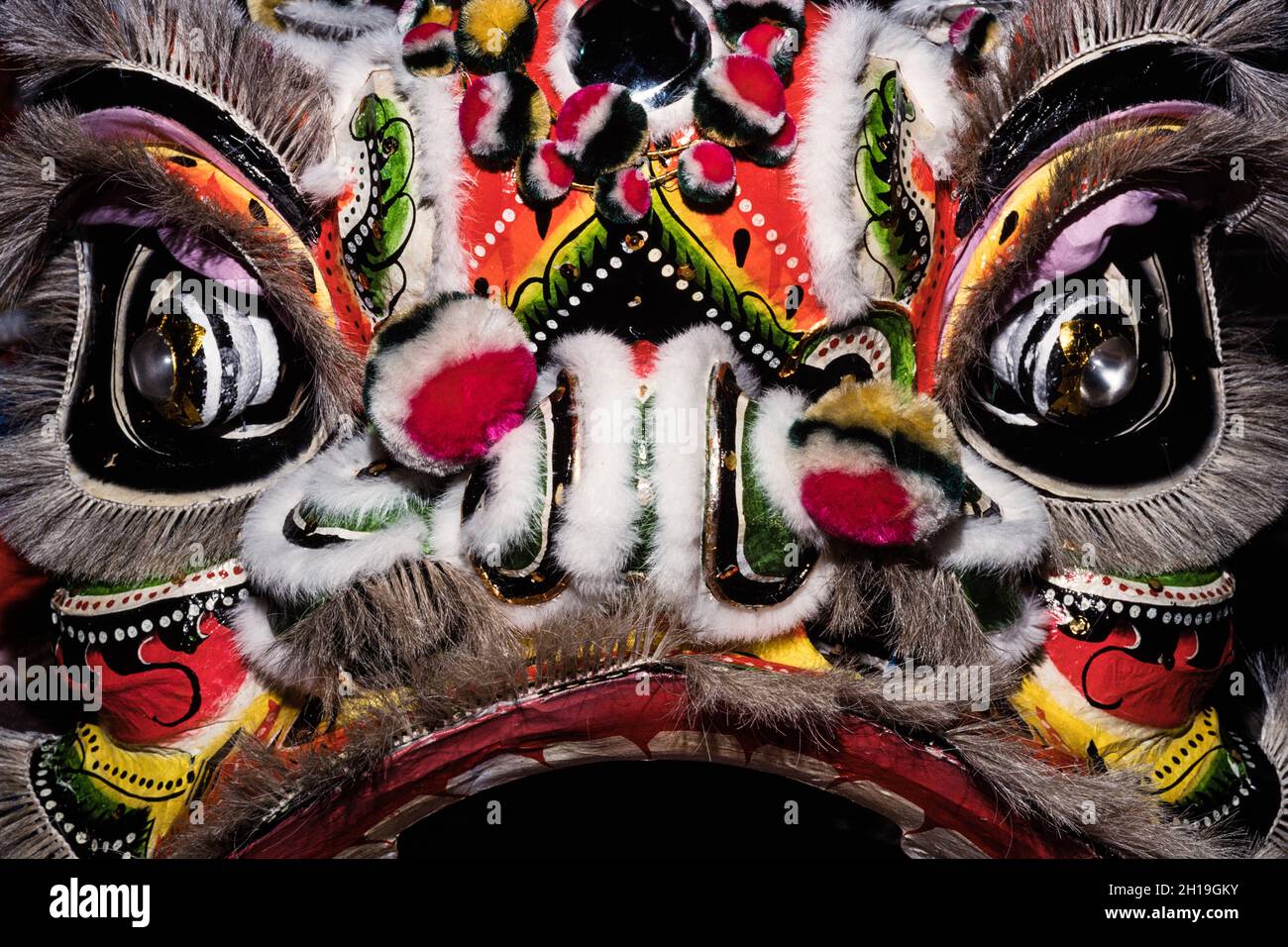 Detail of a Chinese lion dance mask used for celebrating the Chinese ...