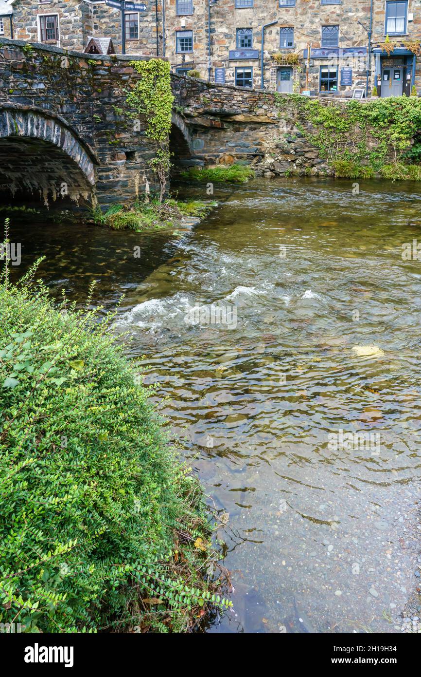 a two arch stone bridge constructed over a river in 1871 in the scenic ...