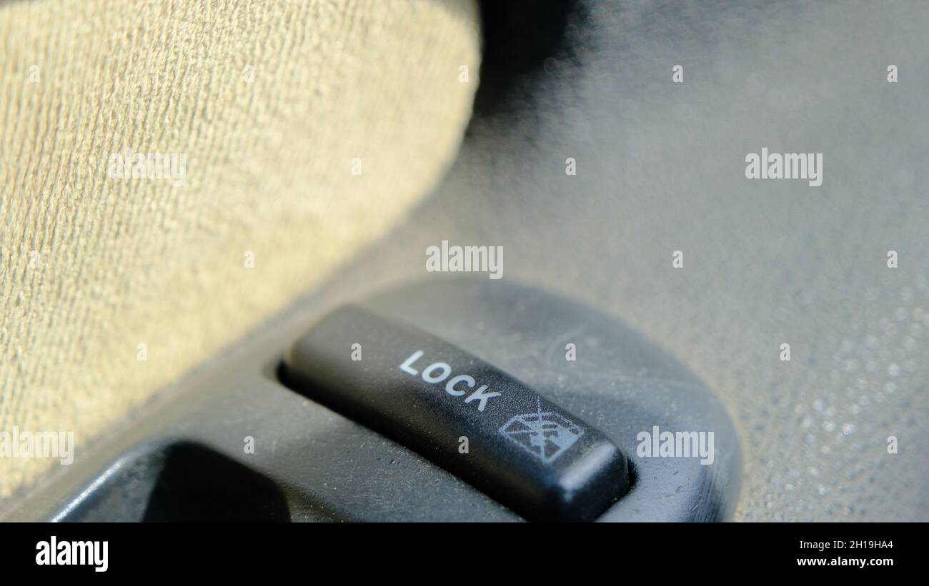 A button inside the car in order to lock the rear windows Stock Photo ...