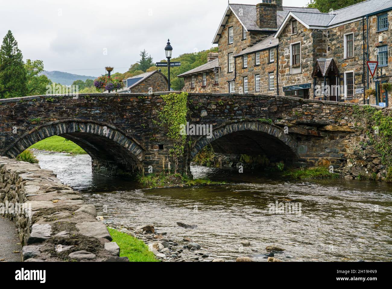 a two arch stone bridge constructed over a river in 1871 in the scenic ...