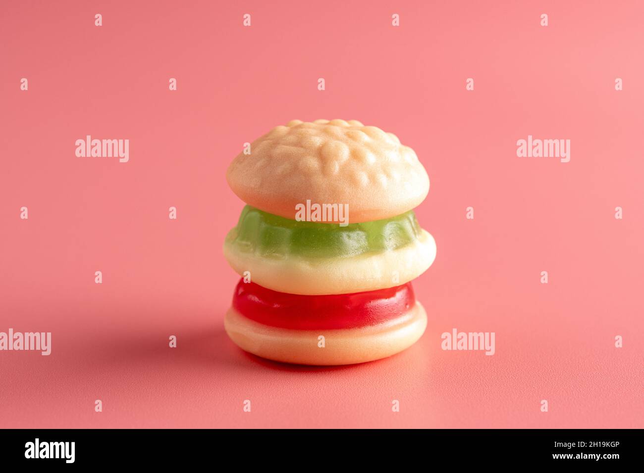 Colorful candy hamburger on pink background. Minimal food concept Stock ...