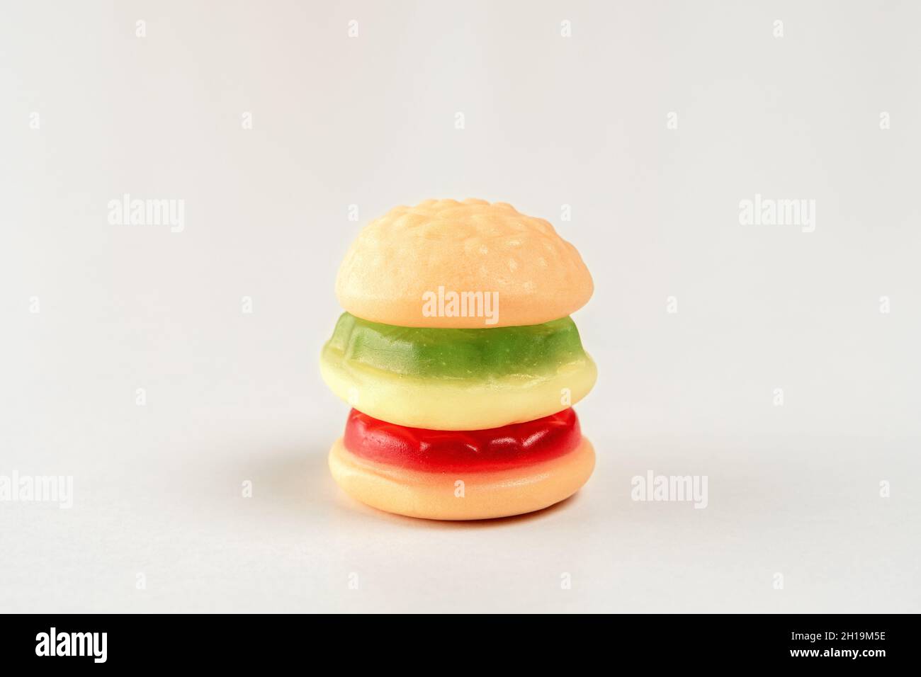 Colorful candy hamburger on white background. Minimal food concept ...