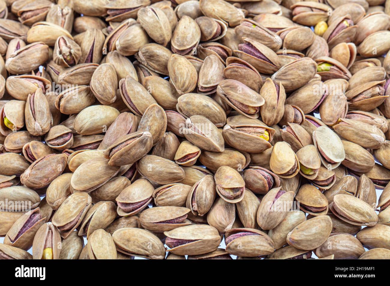 Pistachios texture and background . Tasty pistachios as background,as ...
