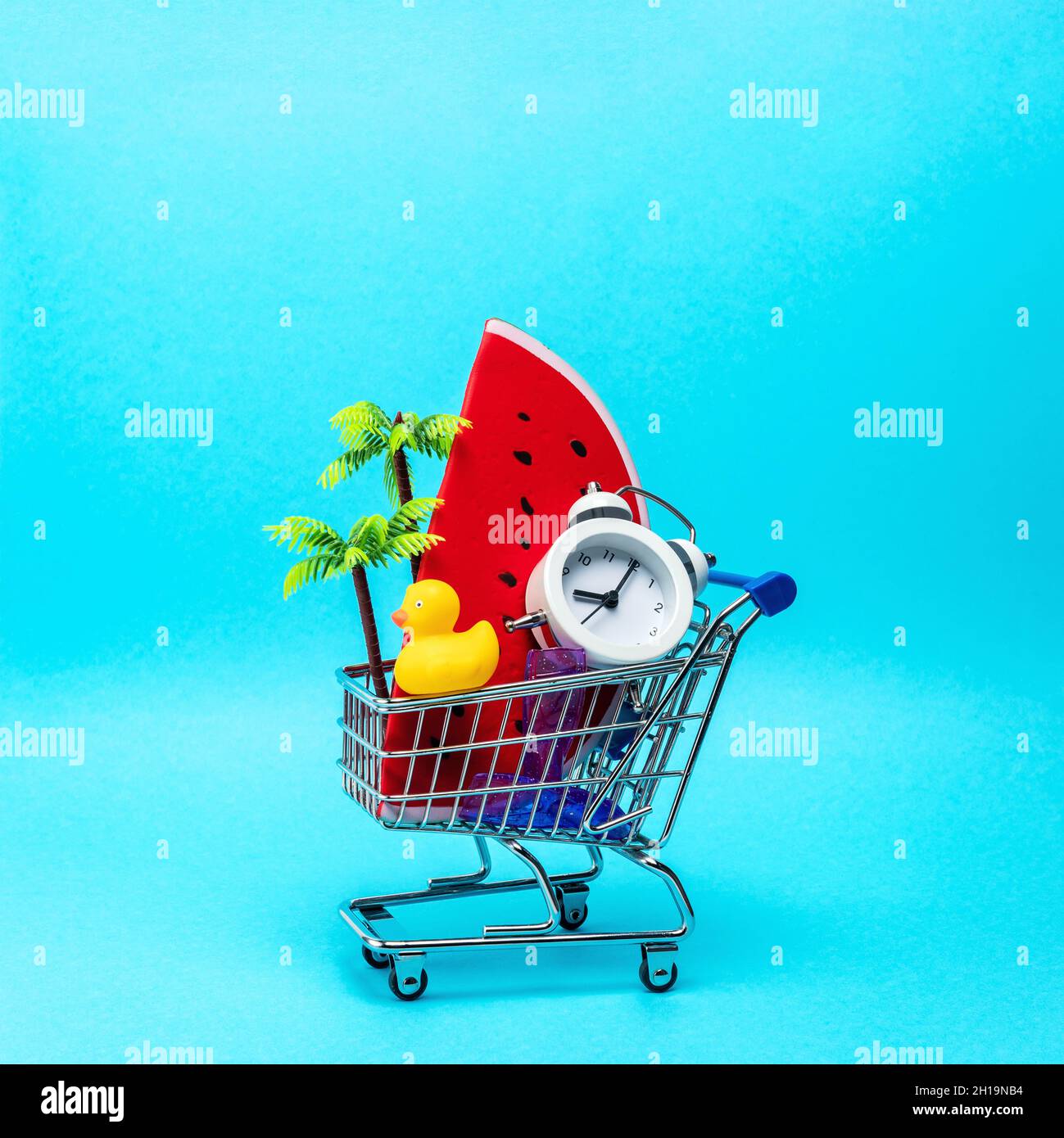 Tropical beach concept made with summer things in shopping troley on ...