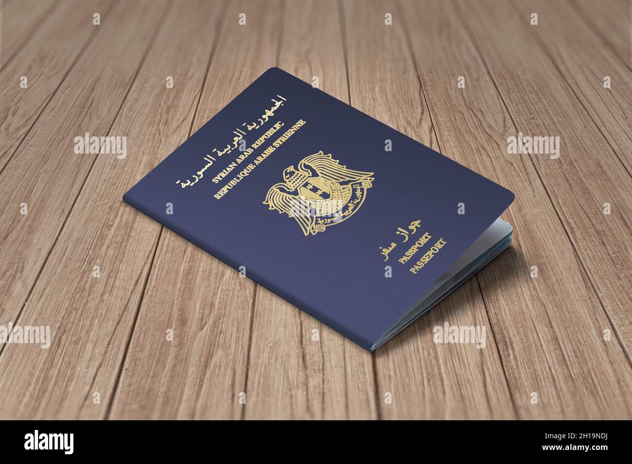 Syrian passport on a dark wooden board, top view Stock Photo - Alamy