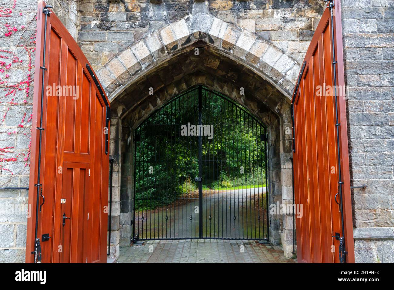 large wooden doors on a medieval castle gatehouse of Penrhyn Castle ...