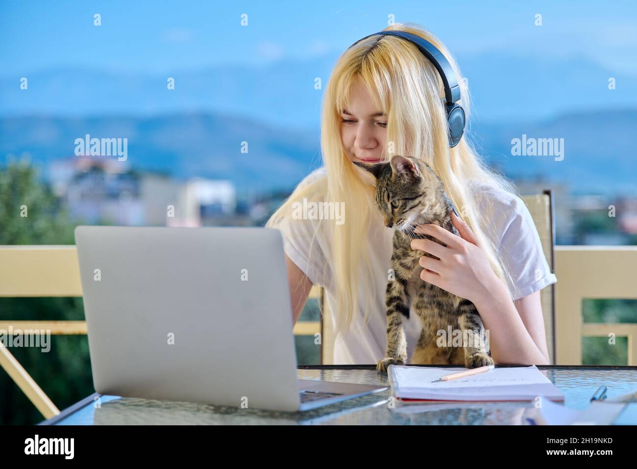 Female student studies at home online using a laptop Stock Photo - Alamy