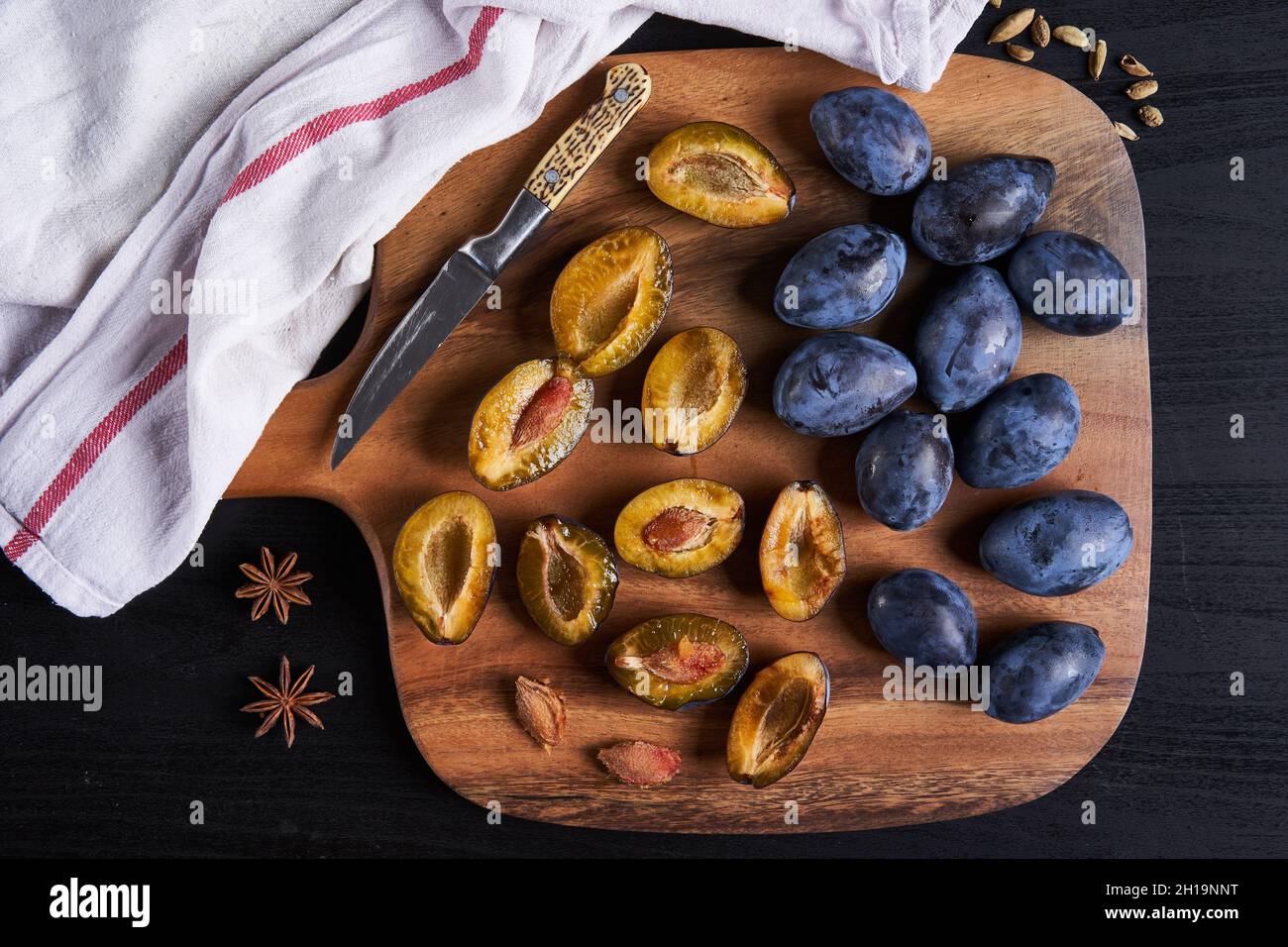 Cooking blue plums jam from freshly picked juicy fruits Stock Photo - Alamy