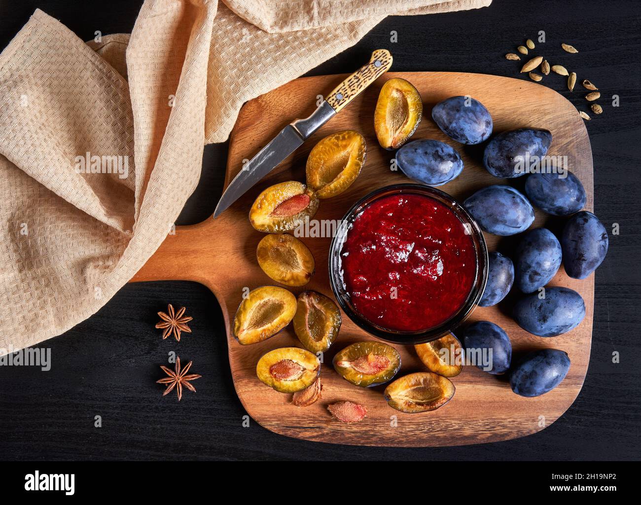 Cooking blue plums jam from freshly picked juicy fruits Stock Photo - Alamy