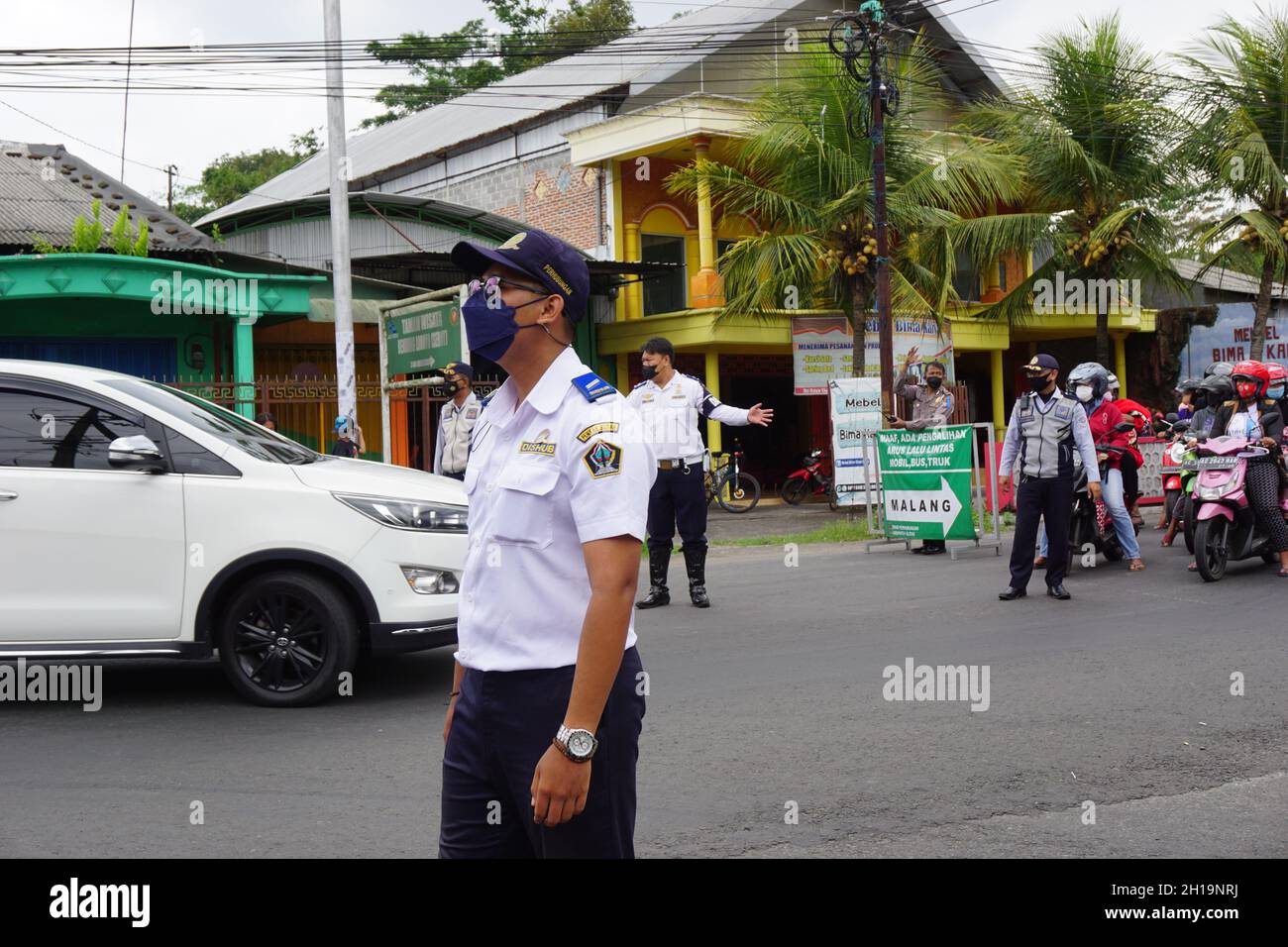The officer of the Department of Transportation regulates road traffic ...