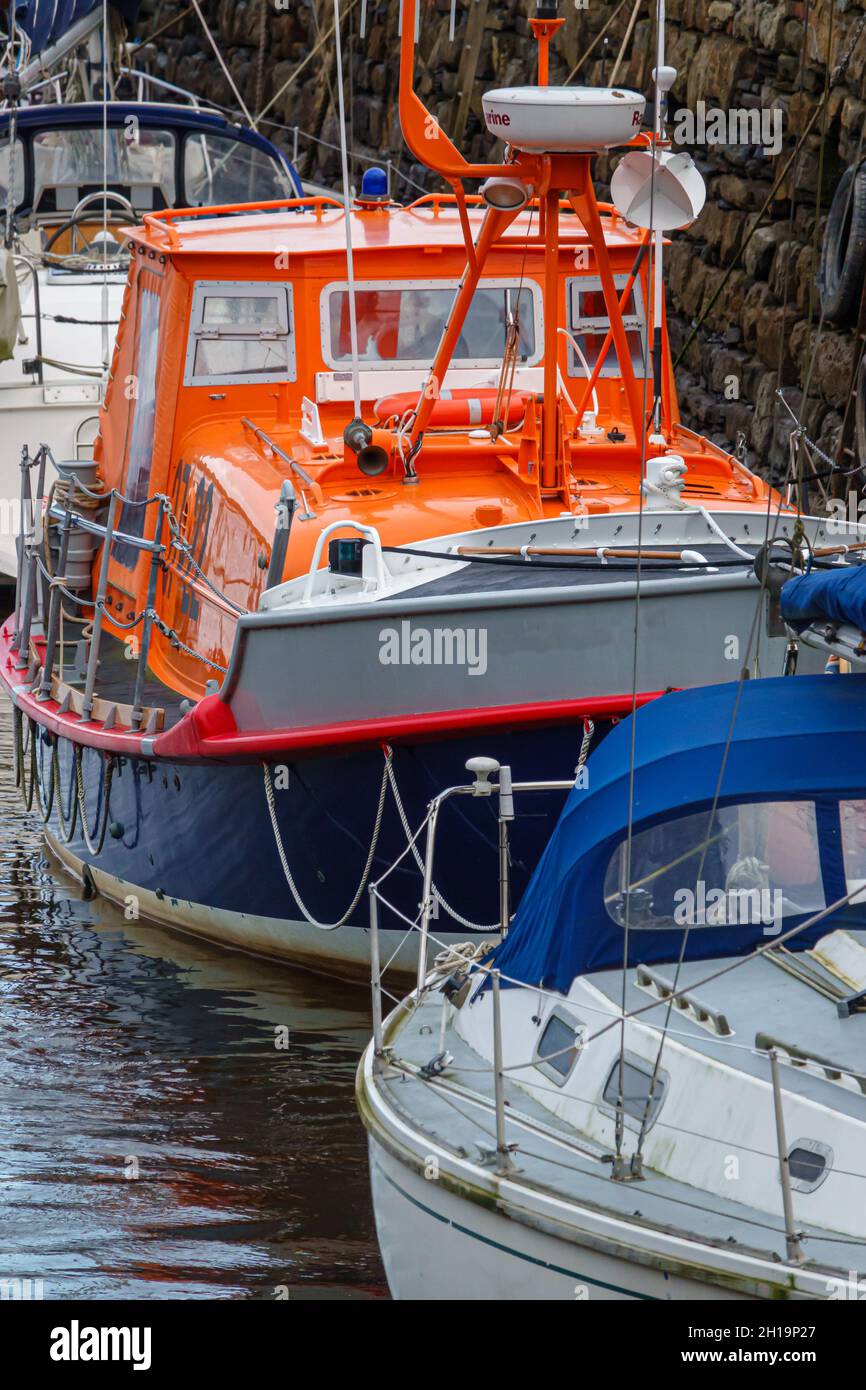 boats moored against the harbour wall Penrhyn Dock Bangor Wales UK ...