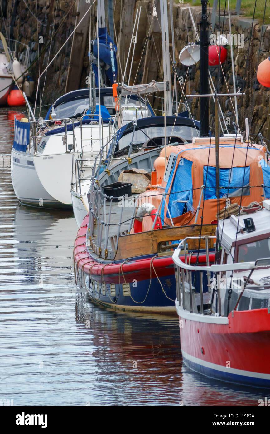 boats moored against the harbour wall Penrhyn Dock Bangor Wales UK ...