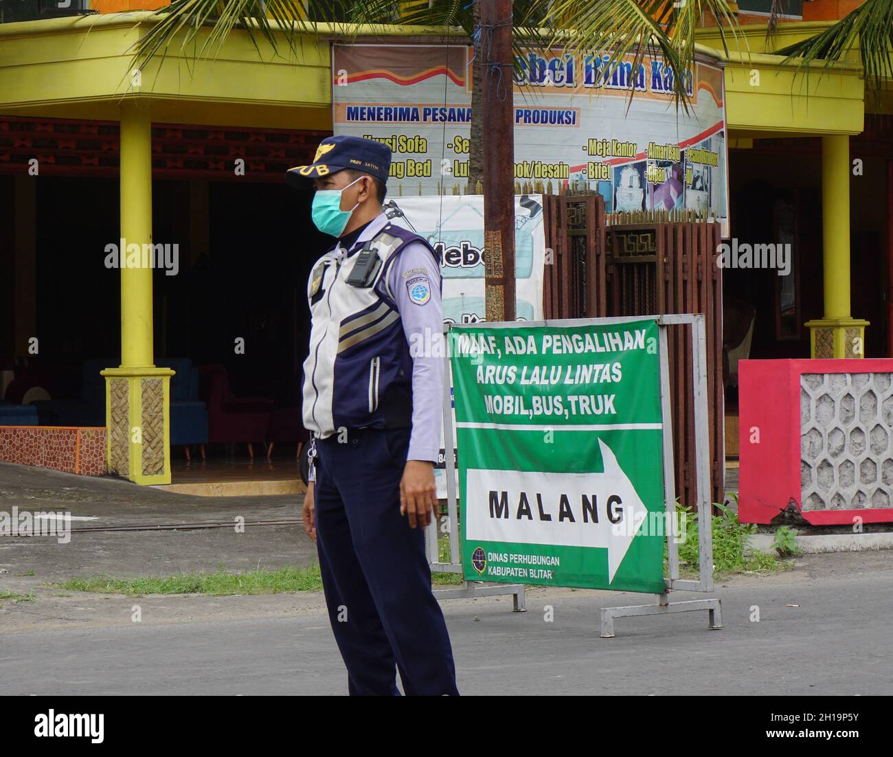 The officer of the Department of Transportation regulates road traffic ...