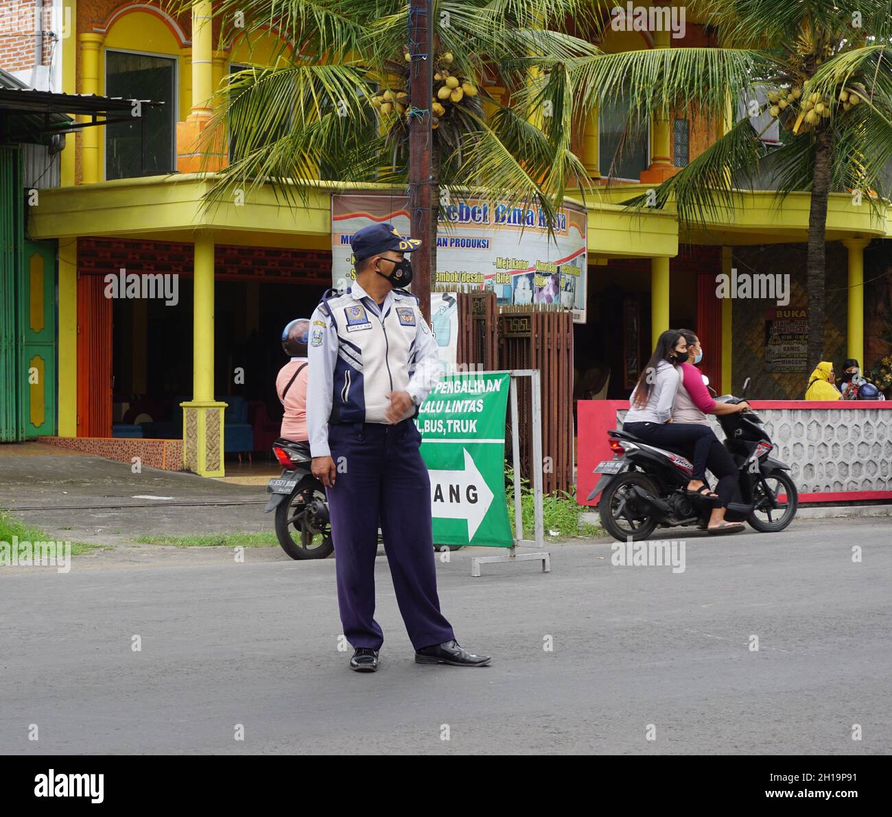 The officer of the Department of Transportation regulates road traffic ...