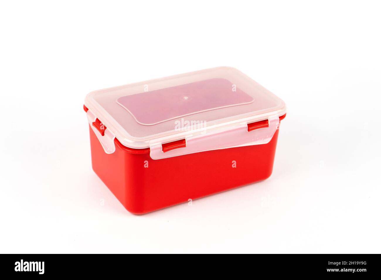 Plastic food container red color isolated on white background. Side ...