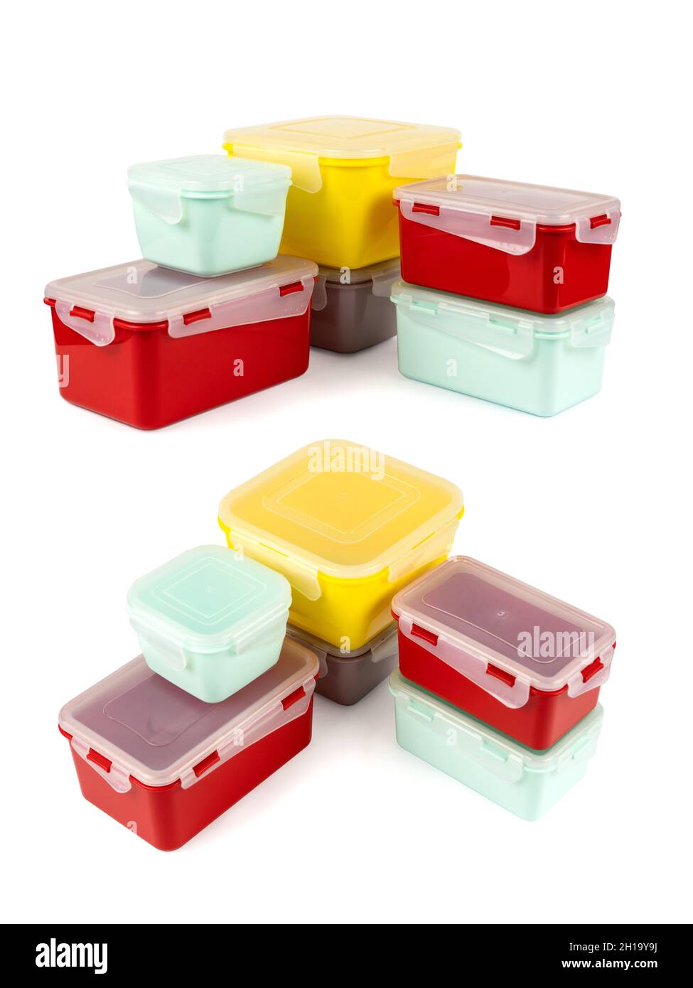 Multicolored plastic lunch boxes folded at corner isolated on white ...