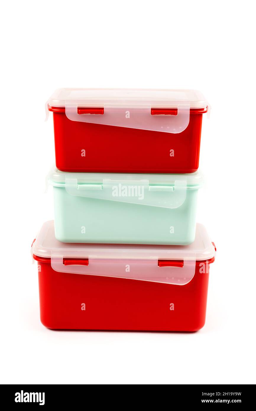Vertical photo. Plastic lunch boxes isolated on white background, side ...