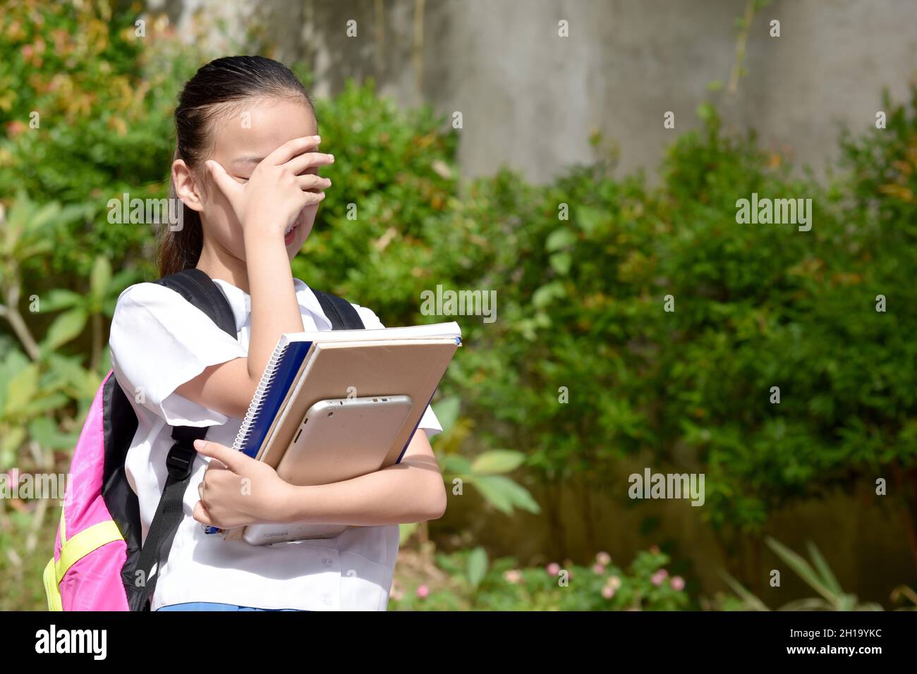 An Ashamed Youthful Girl Student Stock Photo - Alamy