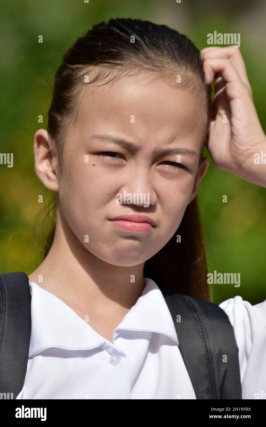 Youthful Diverse Female Student And Confusion Stock Photo - Alamy