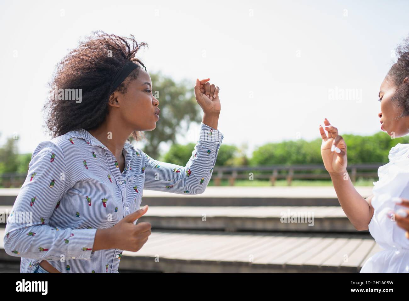 Two women fighting aggression hi-res stock photography and images - Alamy