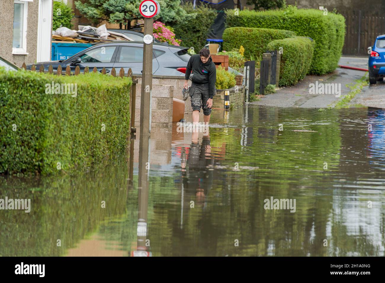 Broomfield Crescent in Edinburgh is flooded after heavy rainfall ...