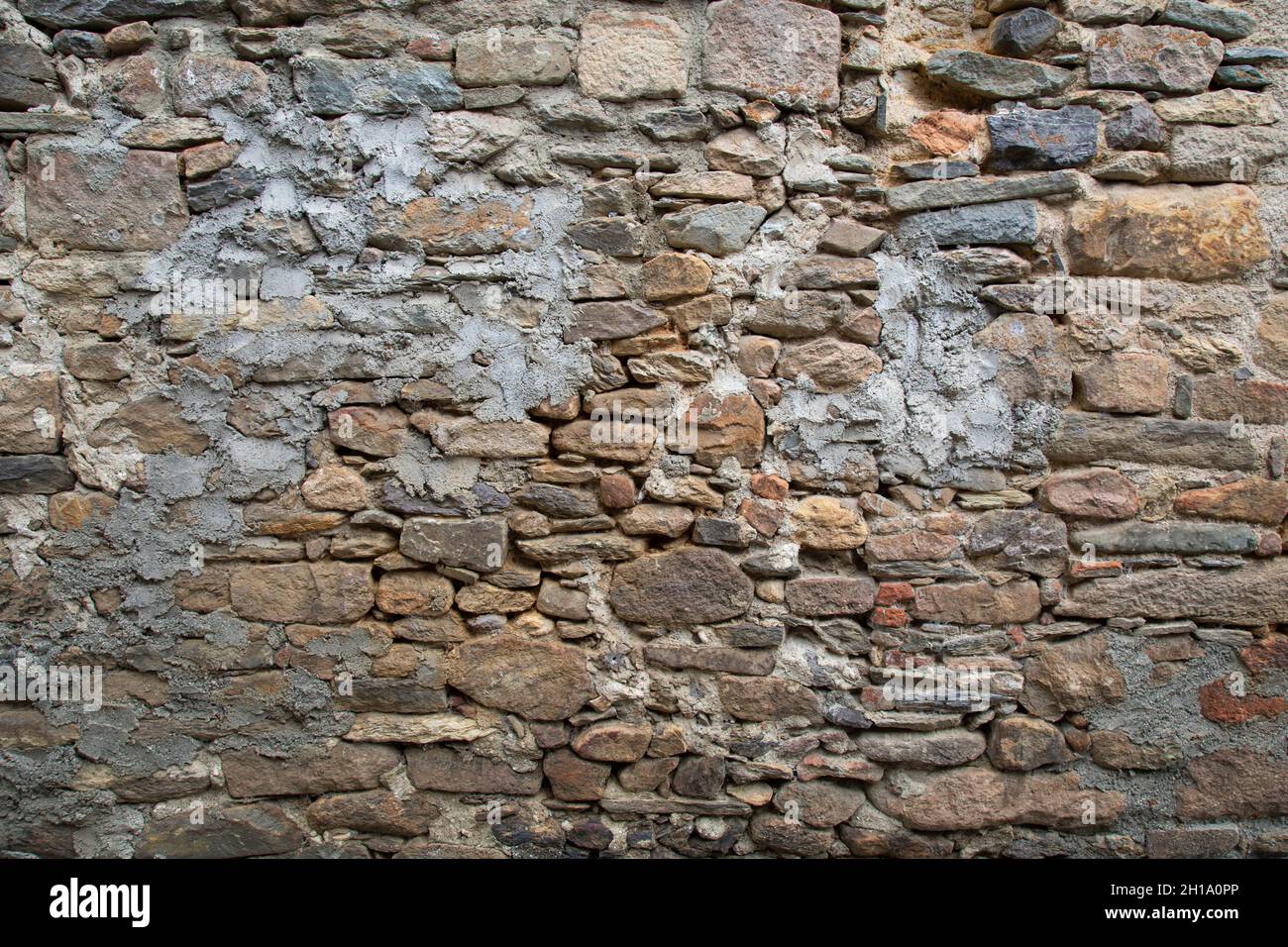 Rough texture of the ancient natural stone wall Stock Photo - Alamy