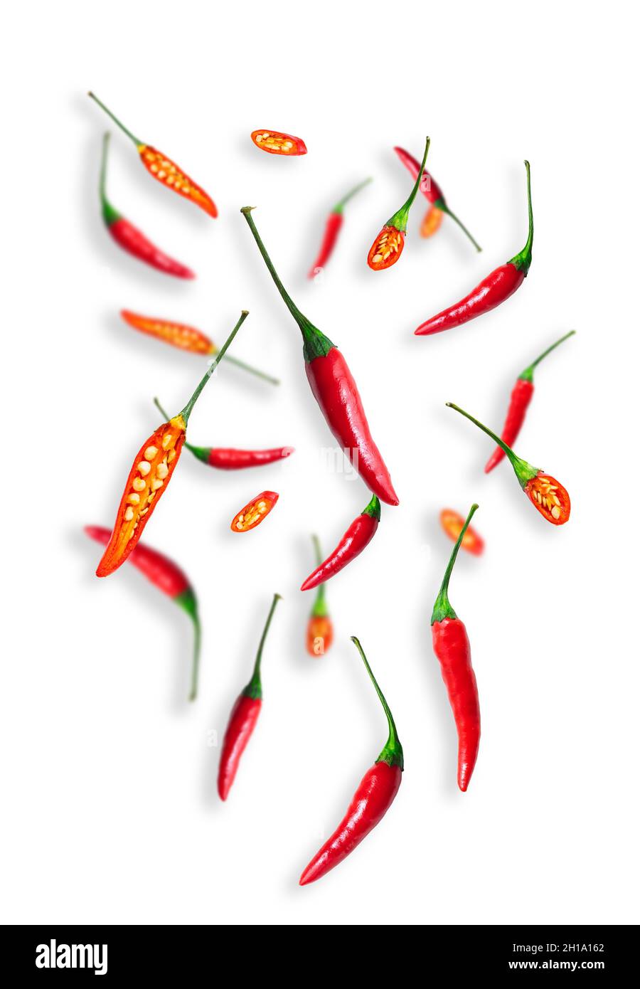 Hot chili peppers and chilli pieces isolated on white background Stock ...
