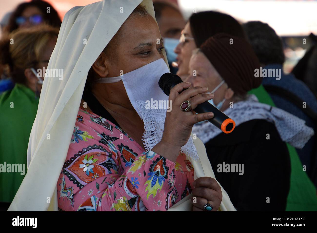 A woman sings an Algerian song during the anniversary.People gathered ...