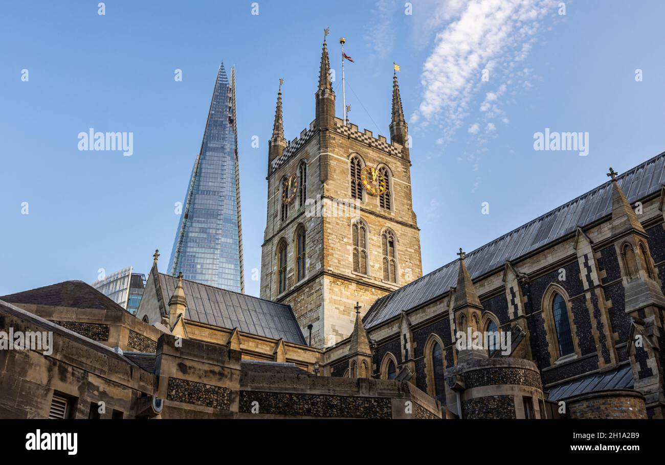 Contrasting old and new architecture: the modern Shard rises behind a ...