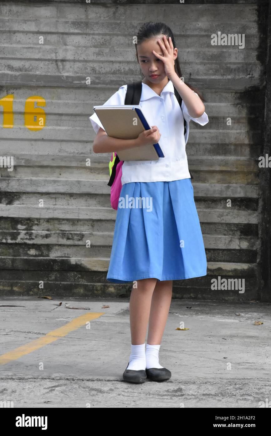 Asian Female Student Under Stress Standing Stock Photo - Alamy