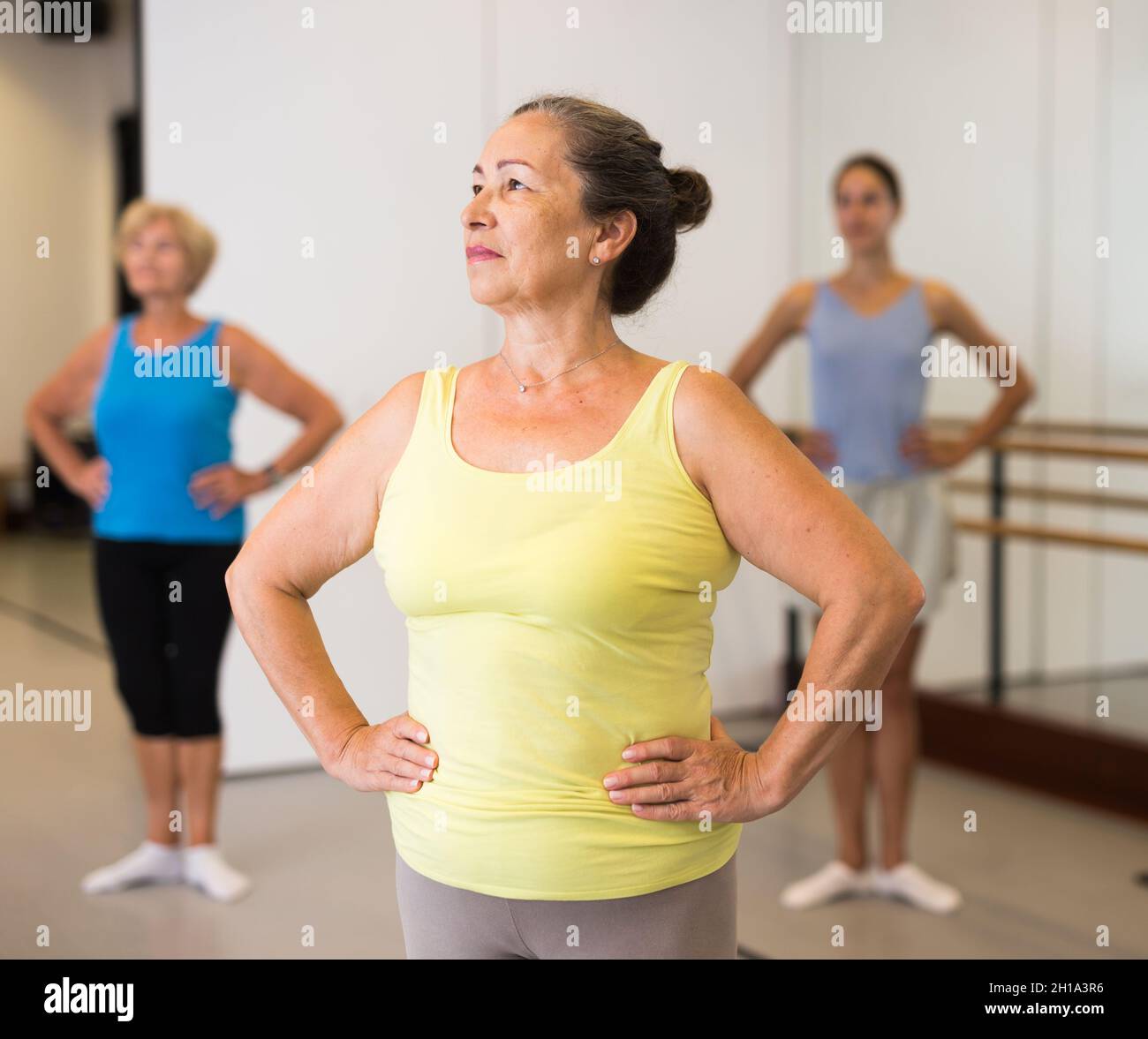 Group of adult people practicing dance techniques Stock Photo - Alamy