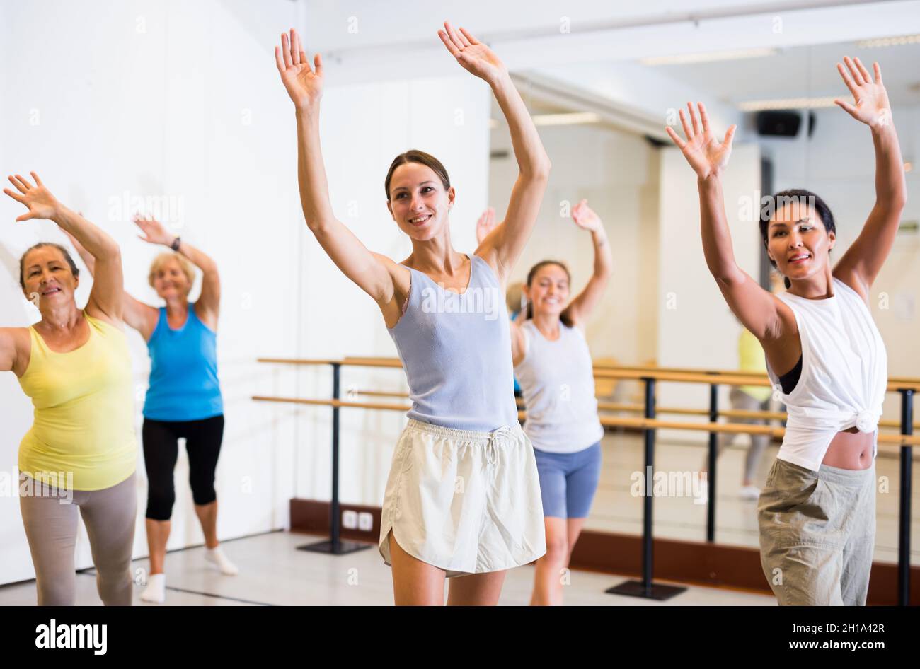 Modern active females dancing excited posing in studio Stock Photo - Alamy