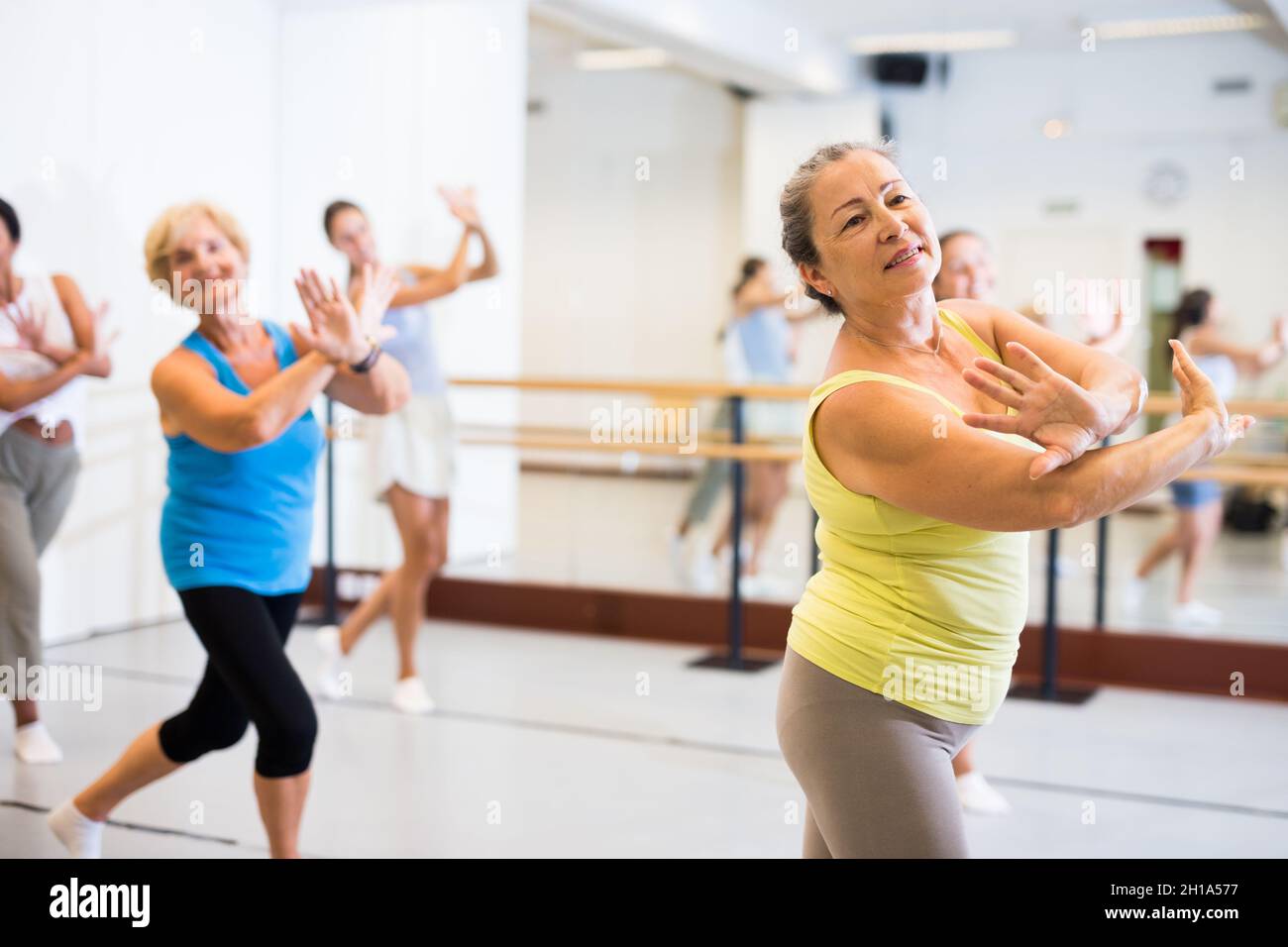 Group of adult people practicing dance techniques Stock Photo - Alamy