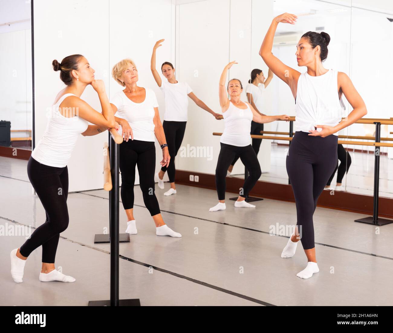 Ballet trainer and students on group training Stock Photo - Alamy