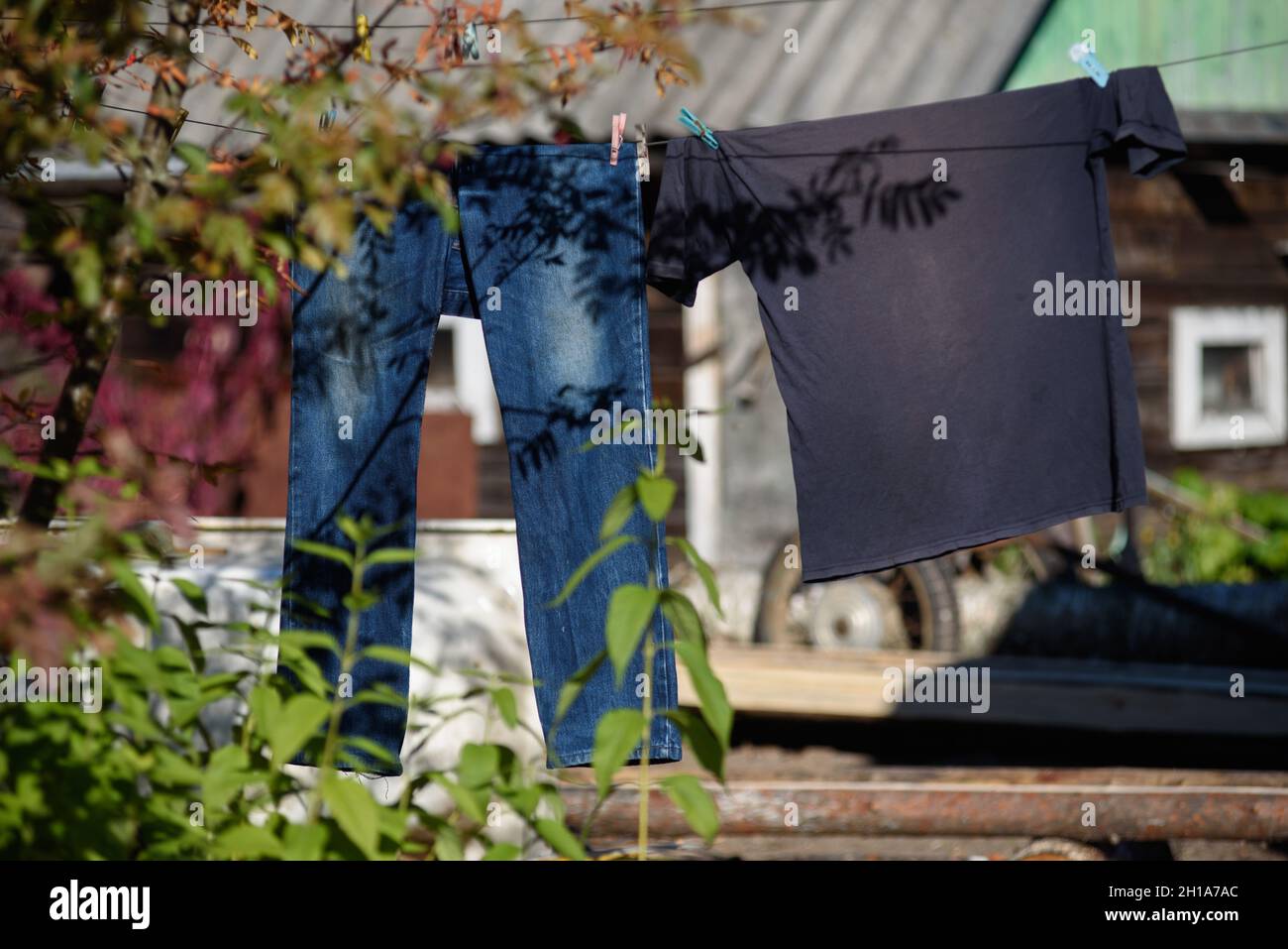 Clothes drying on a rope hi-res stock photography and images - Alamy