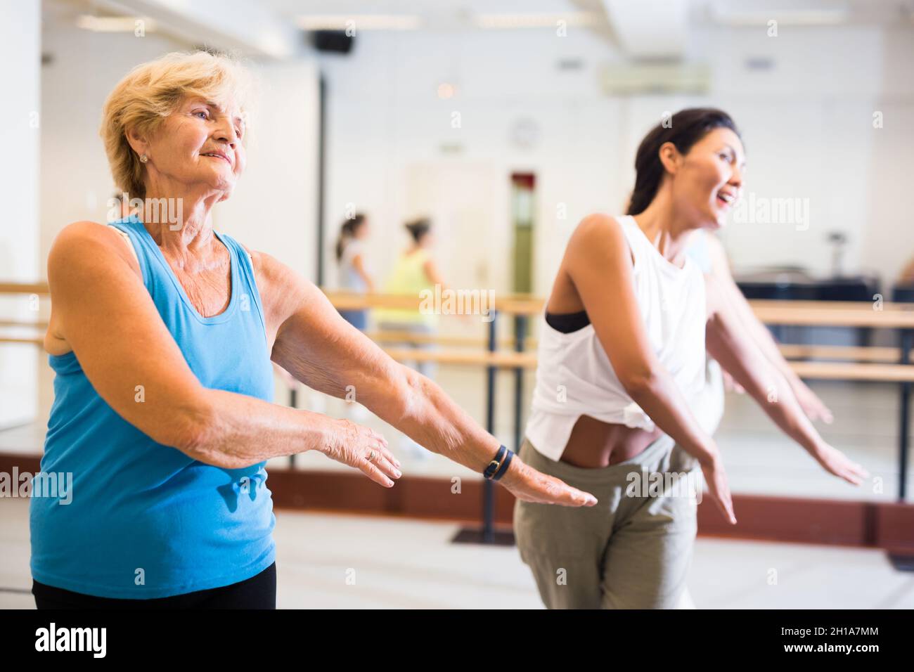 Old lady dancing in studio with women Stock Photo - Alamy
