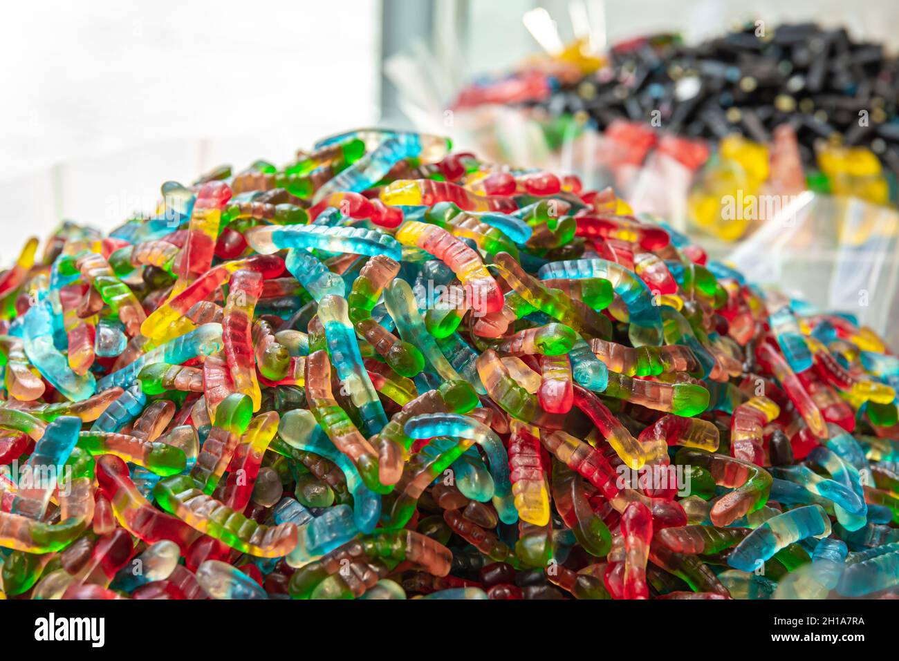Juicy colorful jelly sweets, gummy candies, snakes Stock Photo - Alamy