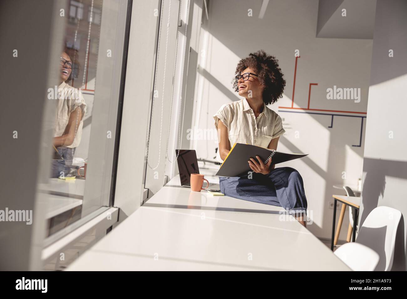Young woman manager sitting coworking hi-res stock photography and ...