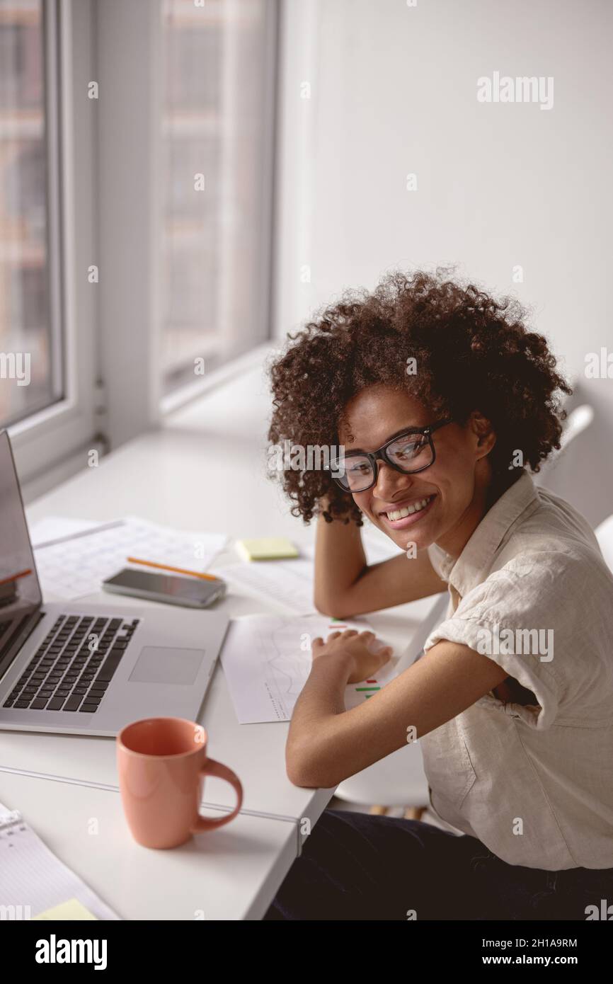 Happy female manager documents hi-res stock photography and images - Alamy