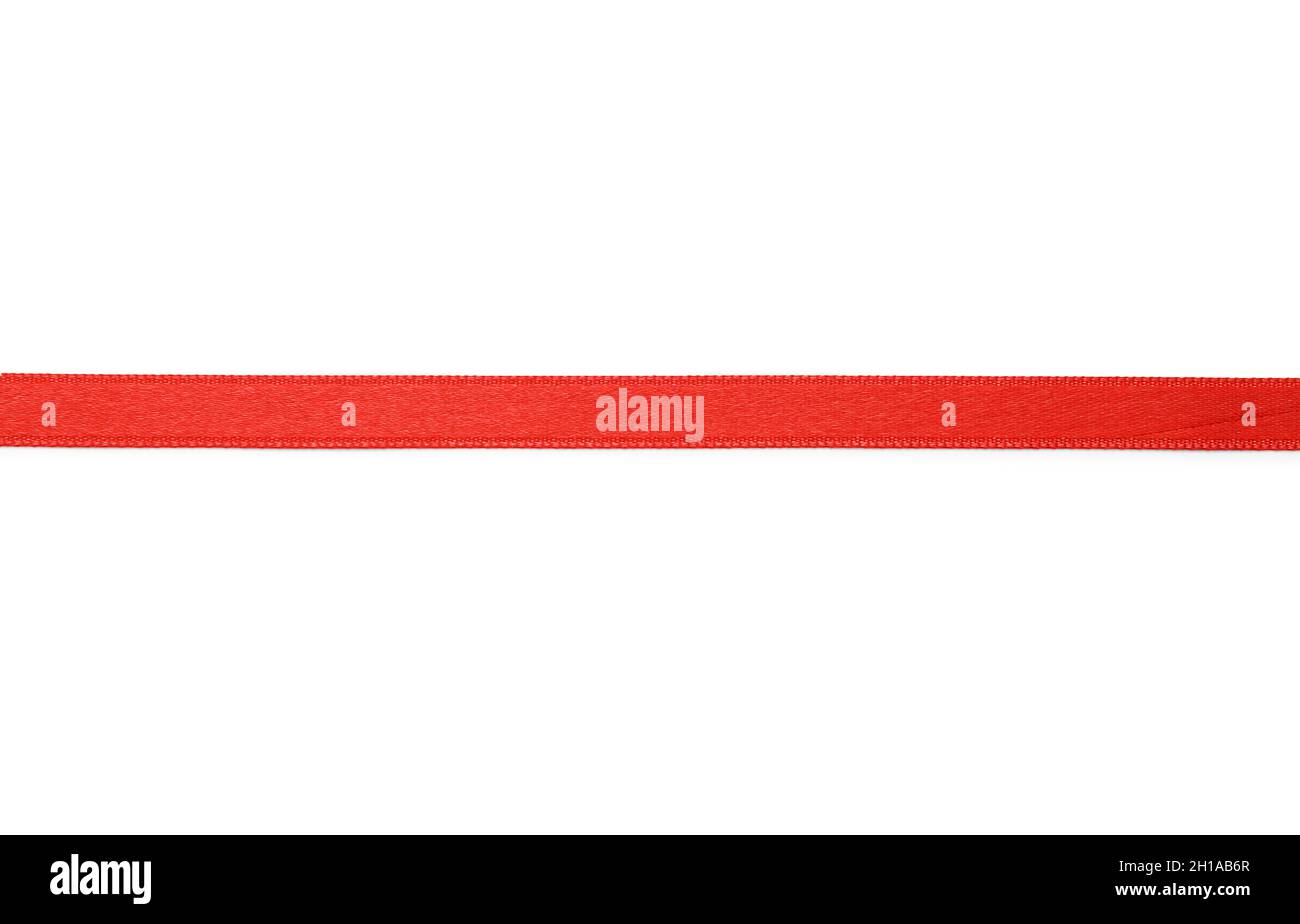 Shiny red ribbon on white background Stock Photo - Alamy