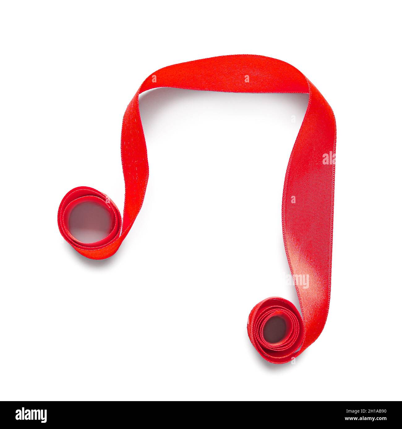 Music note made of red ribbon on white background Stock Photo - Alamy