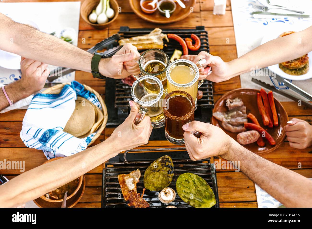group of Friend eating Mexican Tacos and traditional food, snacks and ...